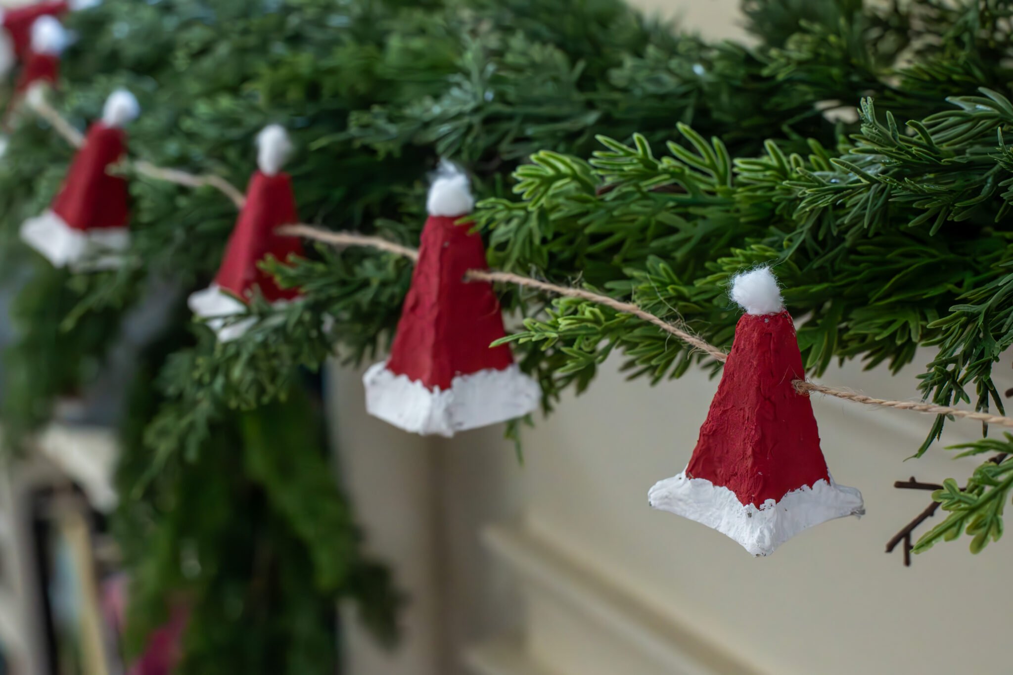 Make this Rustic Santa Hat Garland from Paper Egg Cartons - Holiday ...